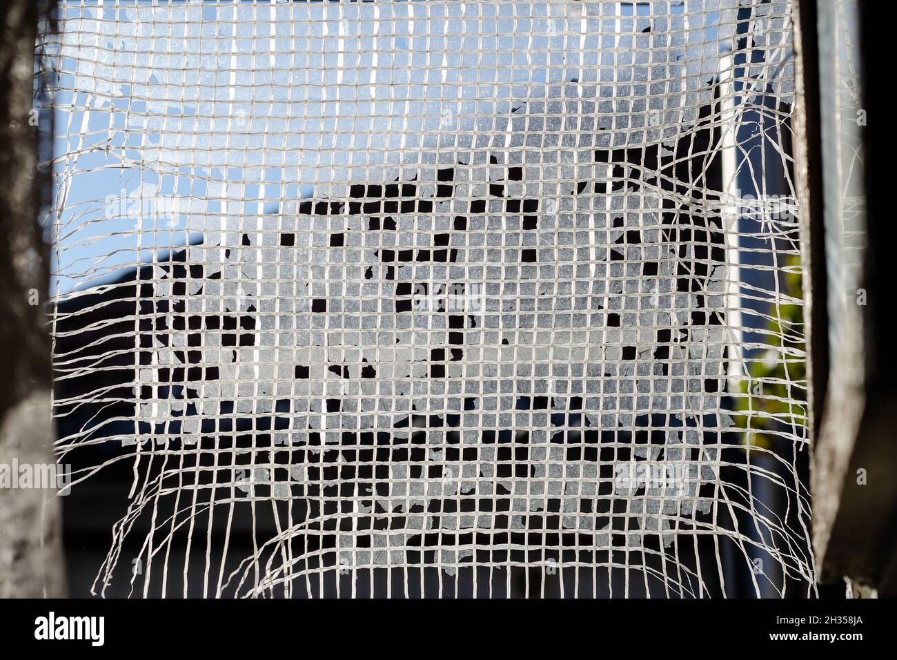 Texture of plastic mesh. Squares of white threads. Selective focus ...