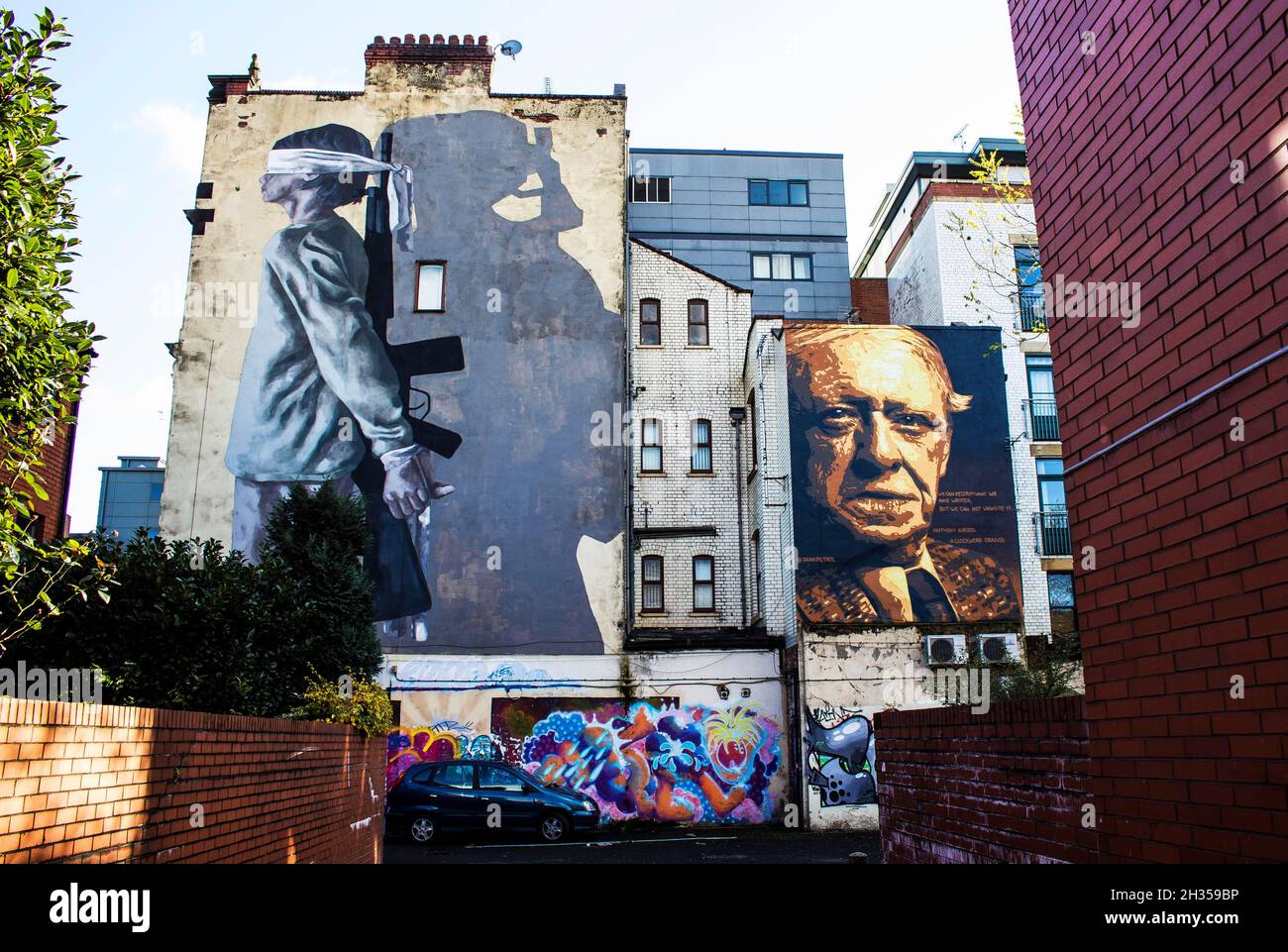 Murals on buildings in the Northern Quarter in Manchester: ‘War impact ...