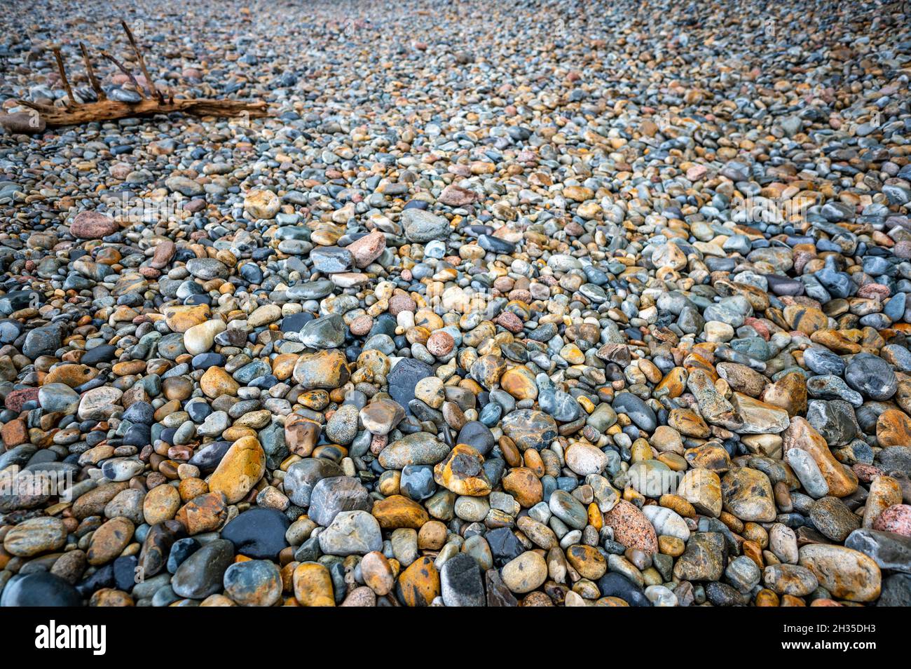 Multi-colored round rocks on Little Hunters Beach in Acadia National ...