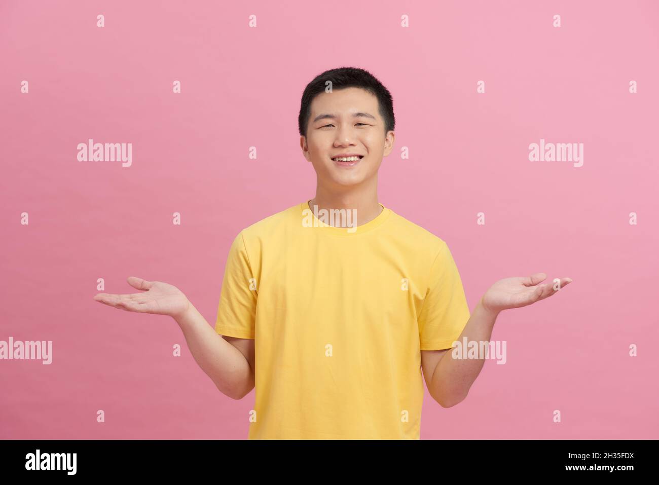 Excited handsome man open hi-res stock photography and images - Alamy