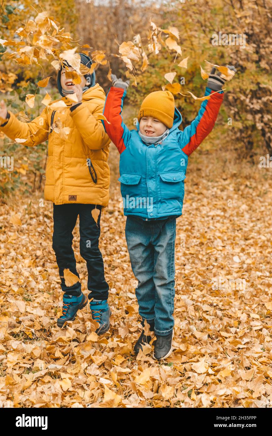 Child in yellow jacket hi-res stock photography and images - Alamy