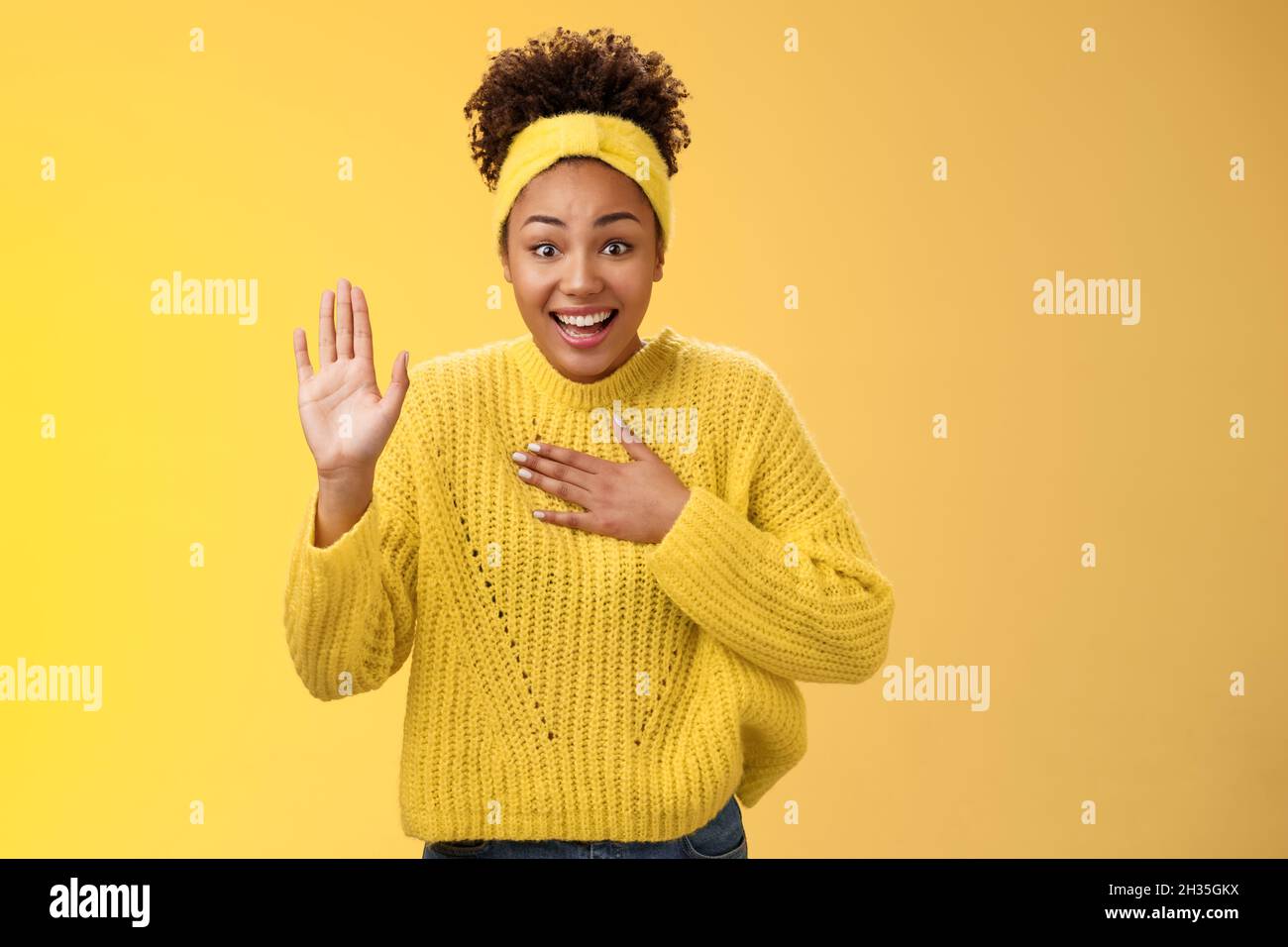 Fascinated amused young charming sincere african-american girl headband ...