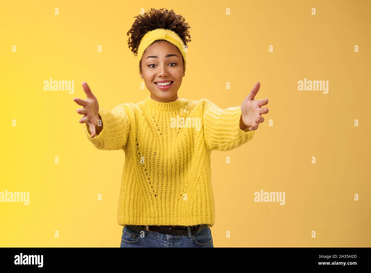 Come closer let me hug you. Touched lovely glad african-american young ...