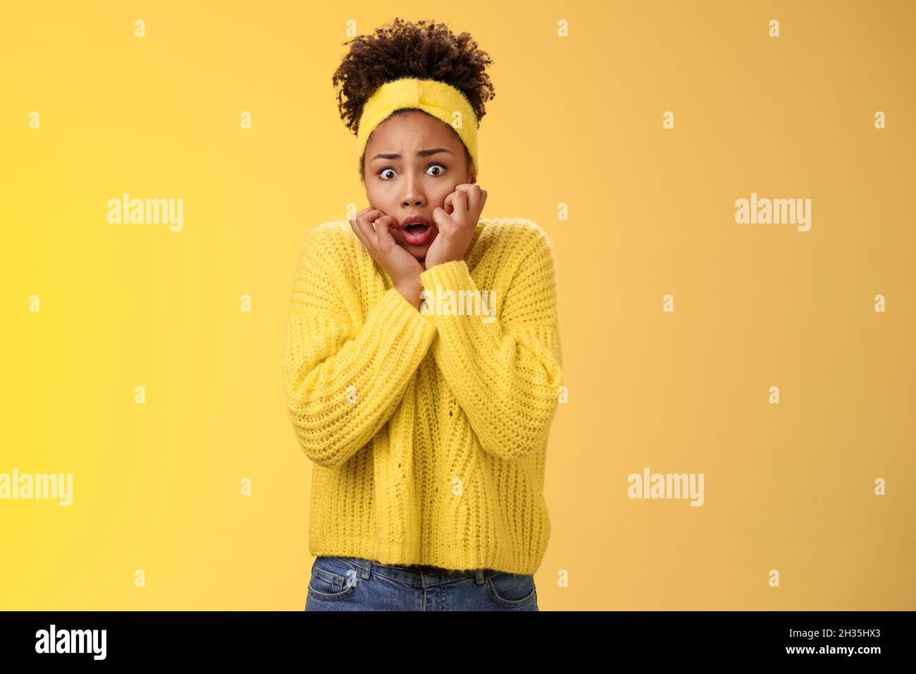 Scared stupefied trembling insecure timid african american woman afraid ...