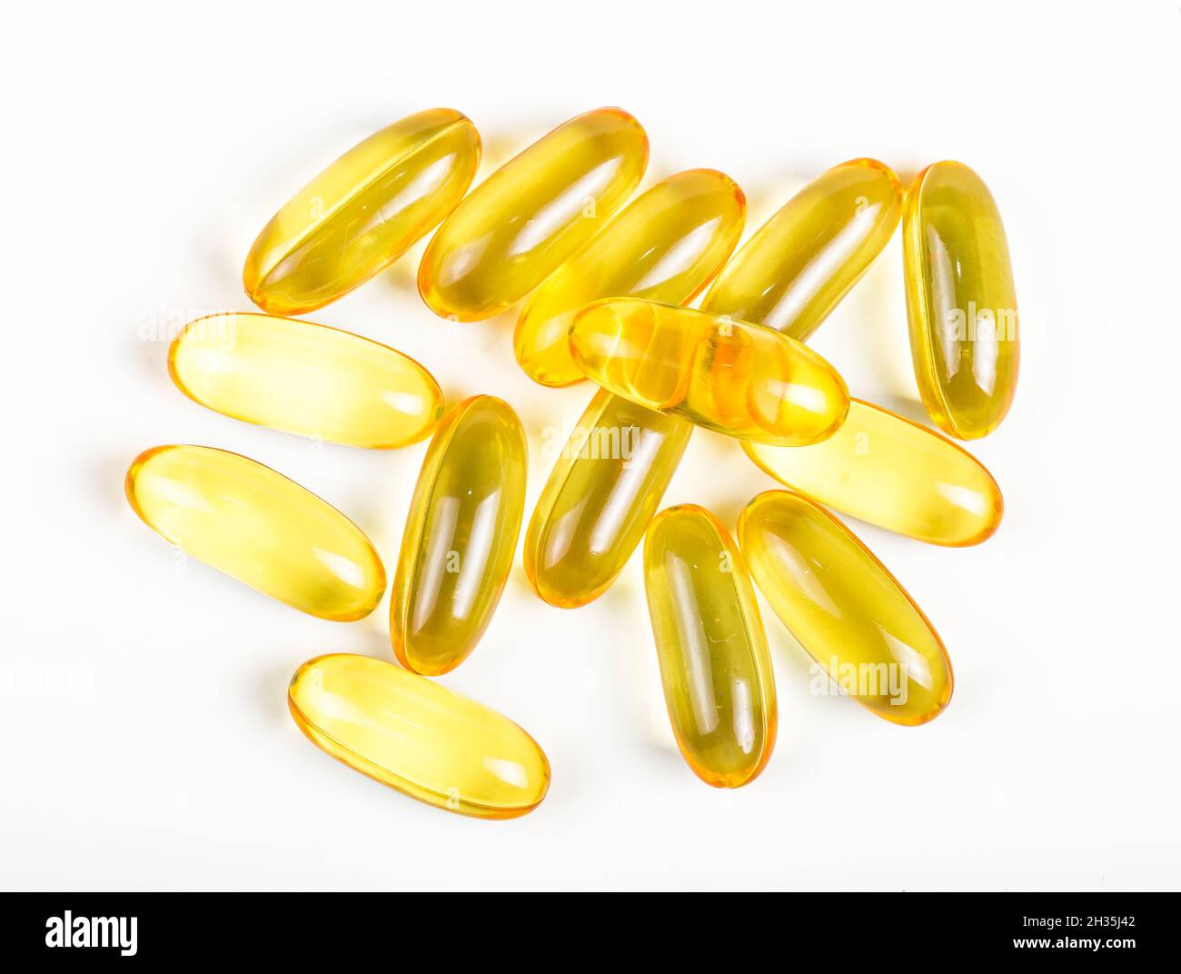 Fish oil orange yellow softgels capsules fish oil omega 3 isolated on ...