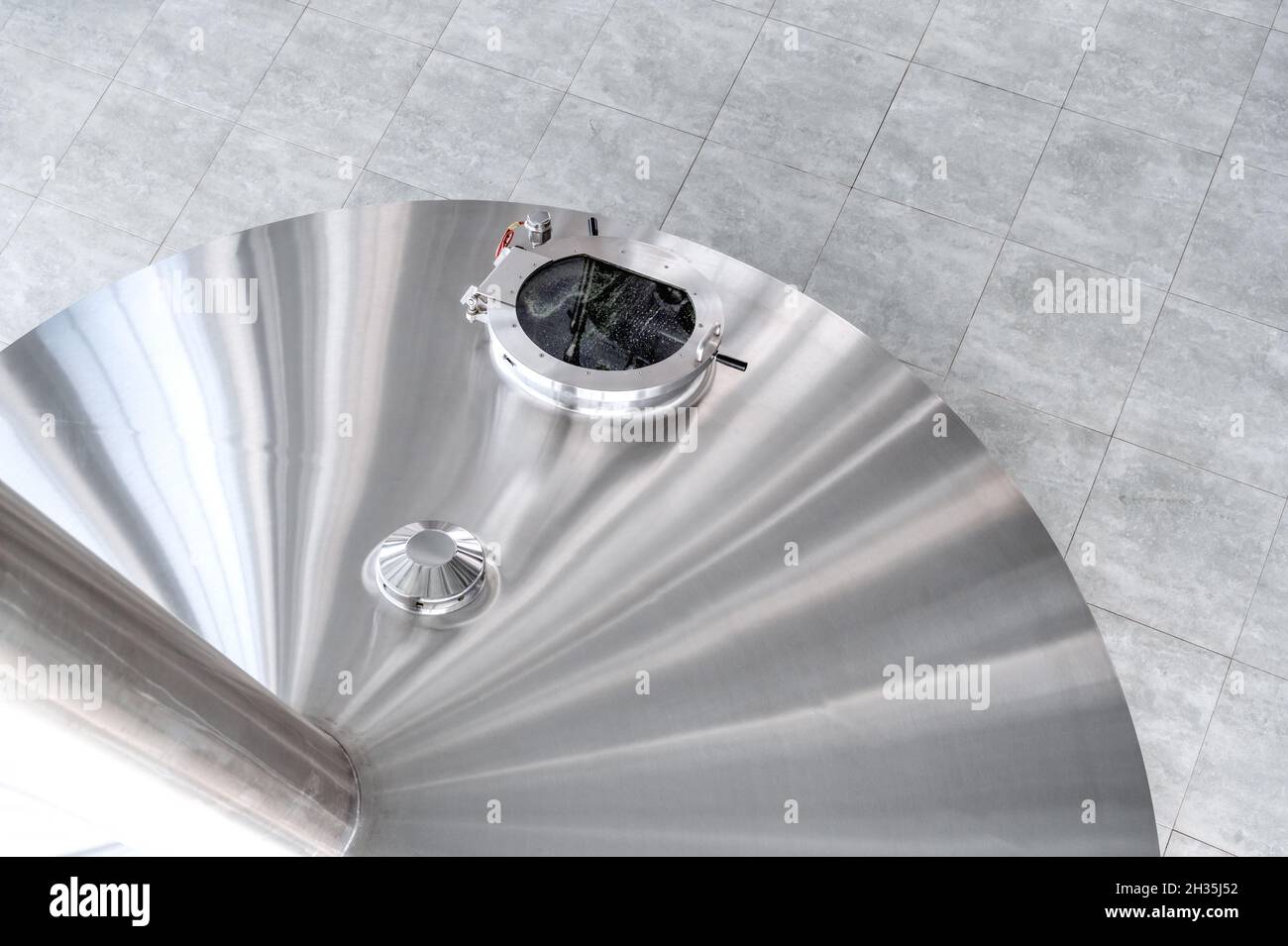 Mash vats of a brewery. Large metal fermentation tanks Stock Photo - Alamy