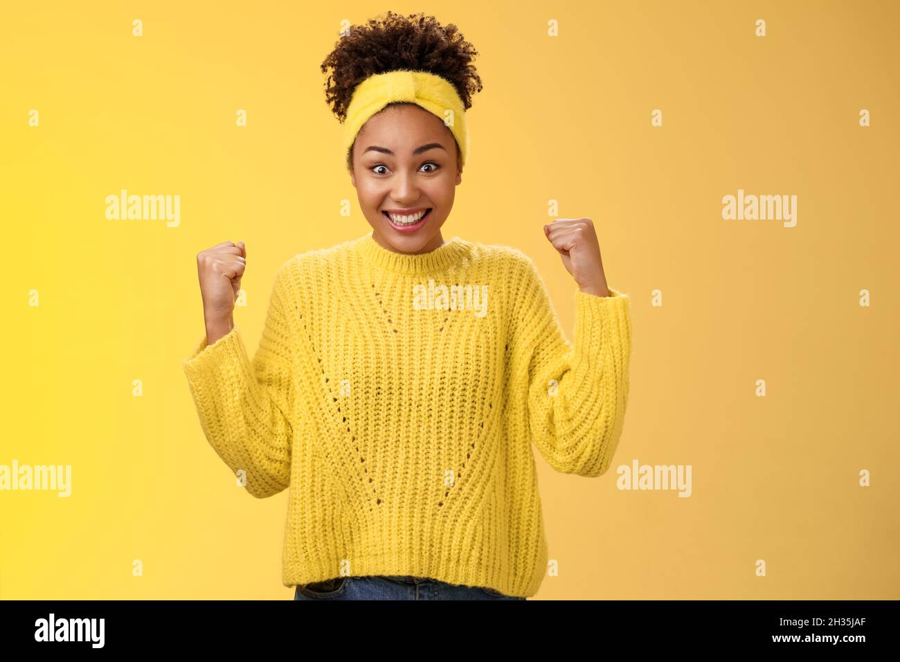 Surprised cute tender african-american girl cannot believe win prize ...