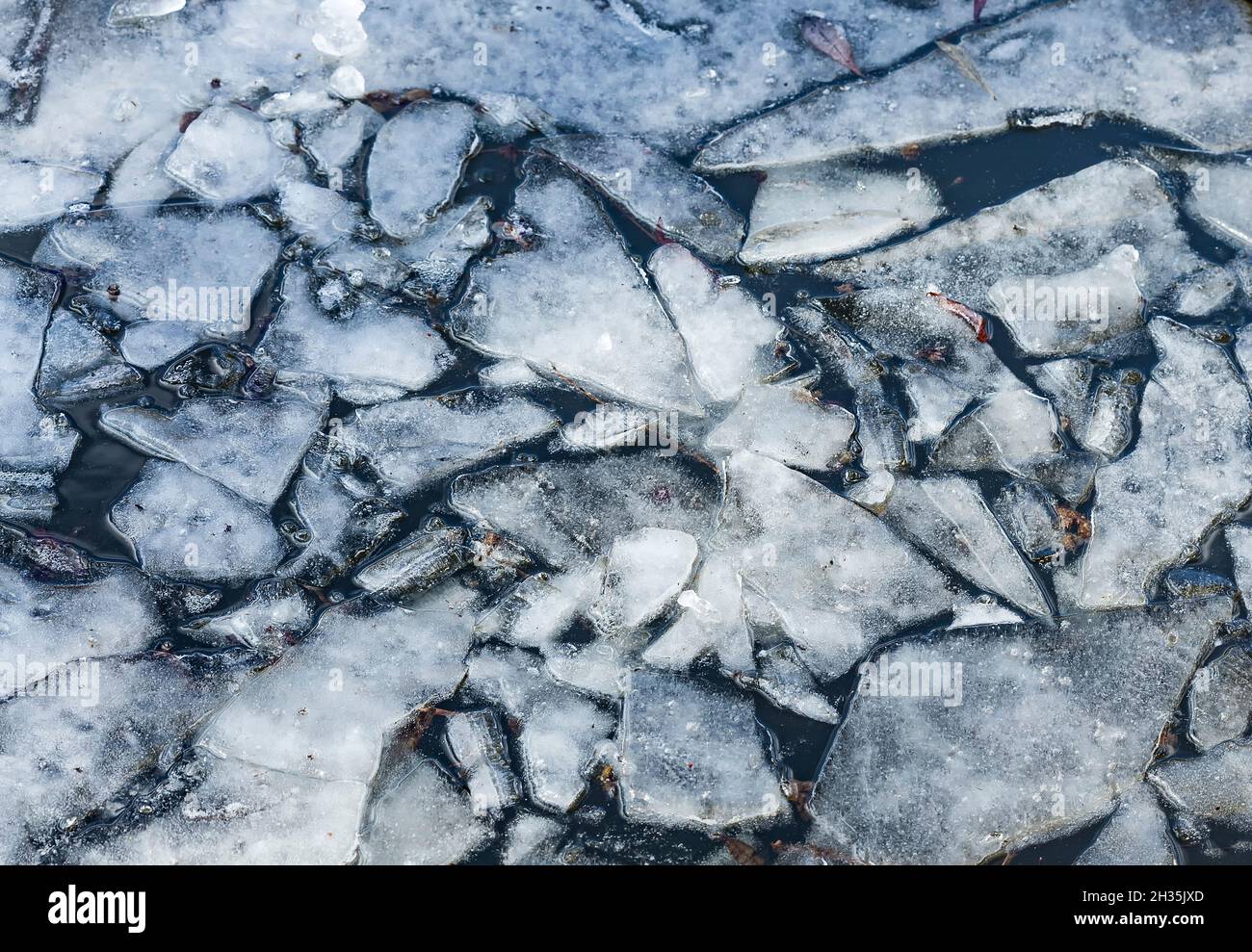 Drifting spring ice pieces on the river. Early spring background ...