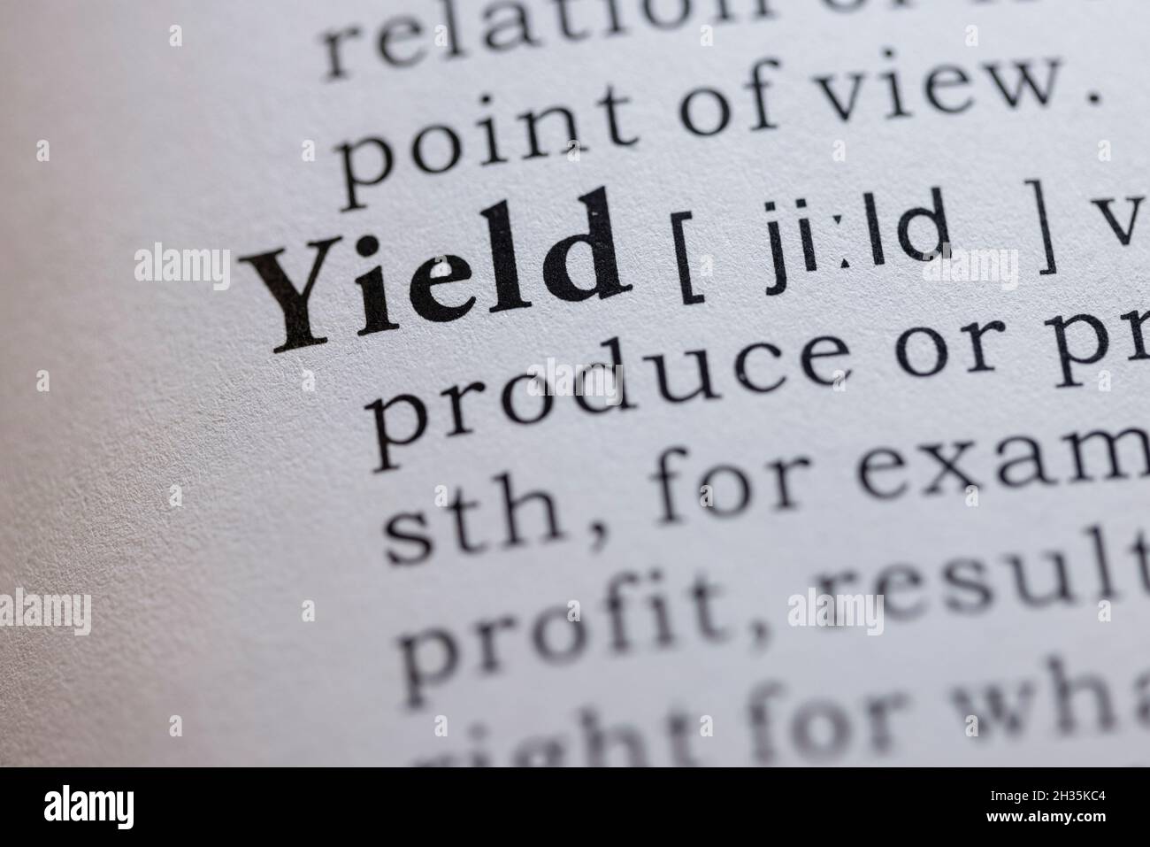Fake Dictionary word, Dictionary definition of yield Stock Photo - Alamy