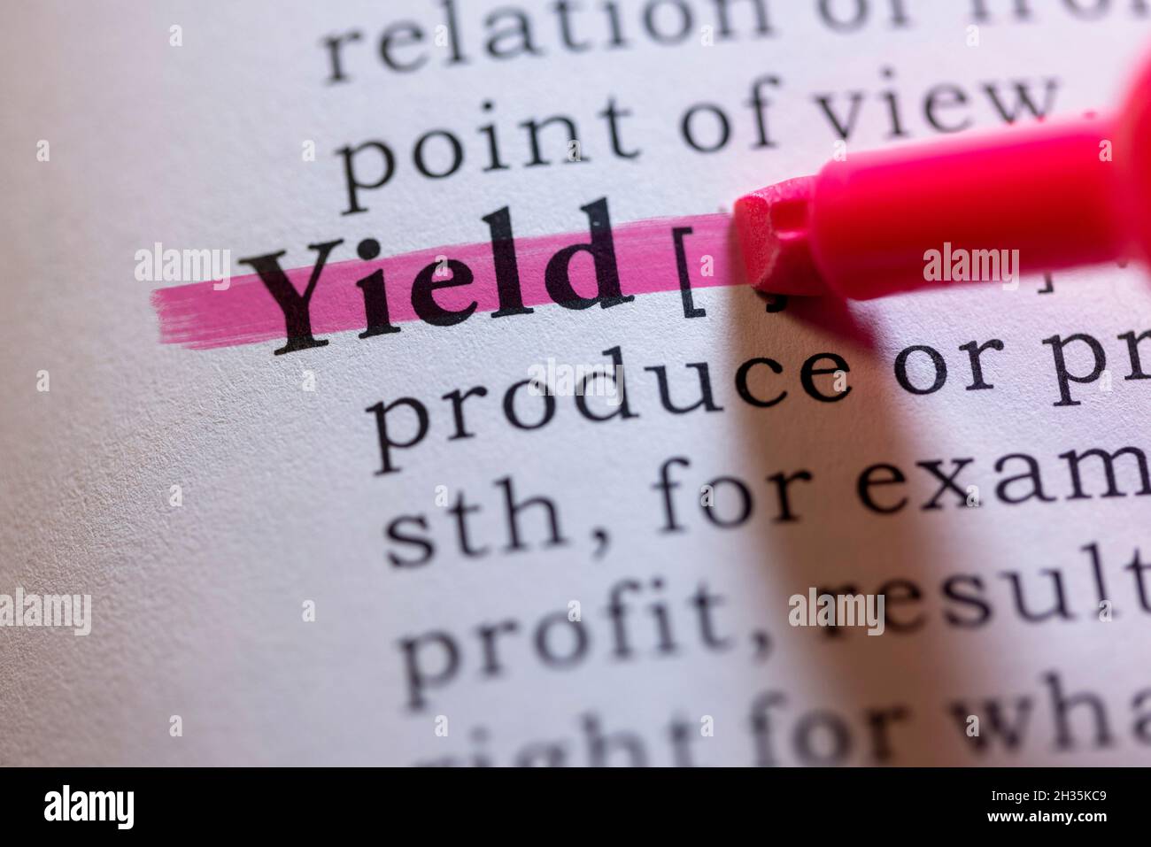 Fake Dictionary word, Dictionary definition of yield Stock Photo - Alamy