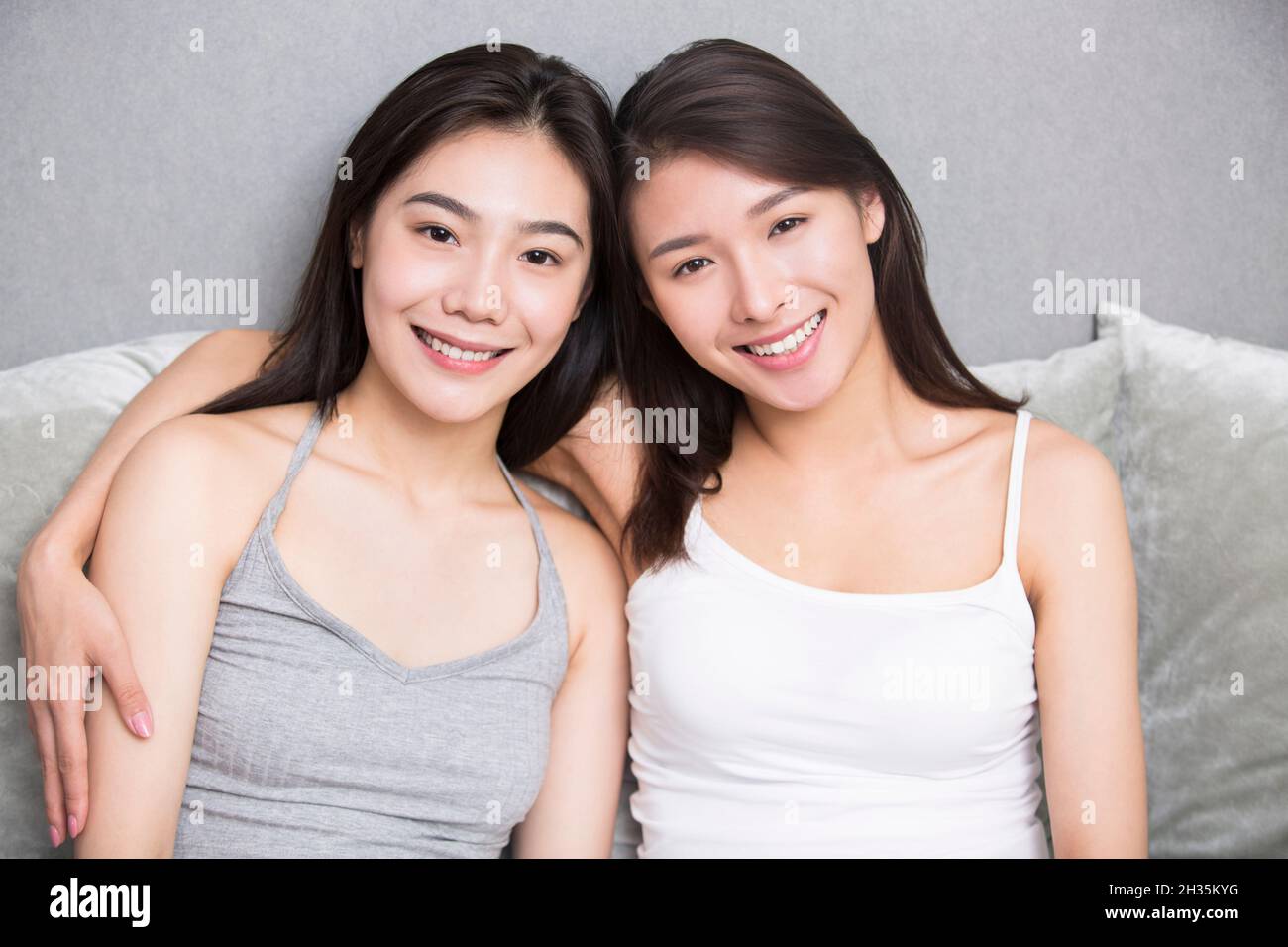 Two best friends taking a picture Stock Photo - Alamy
