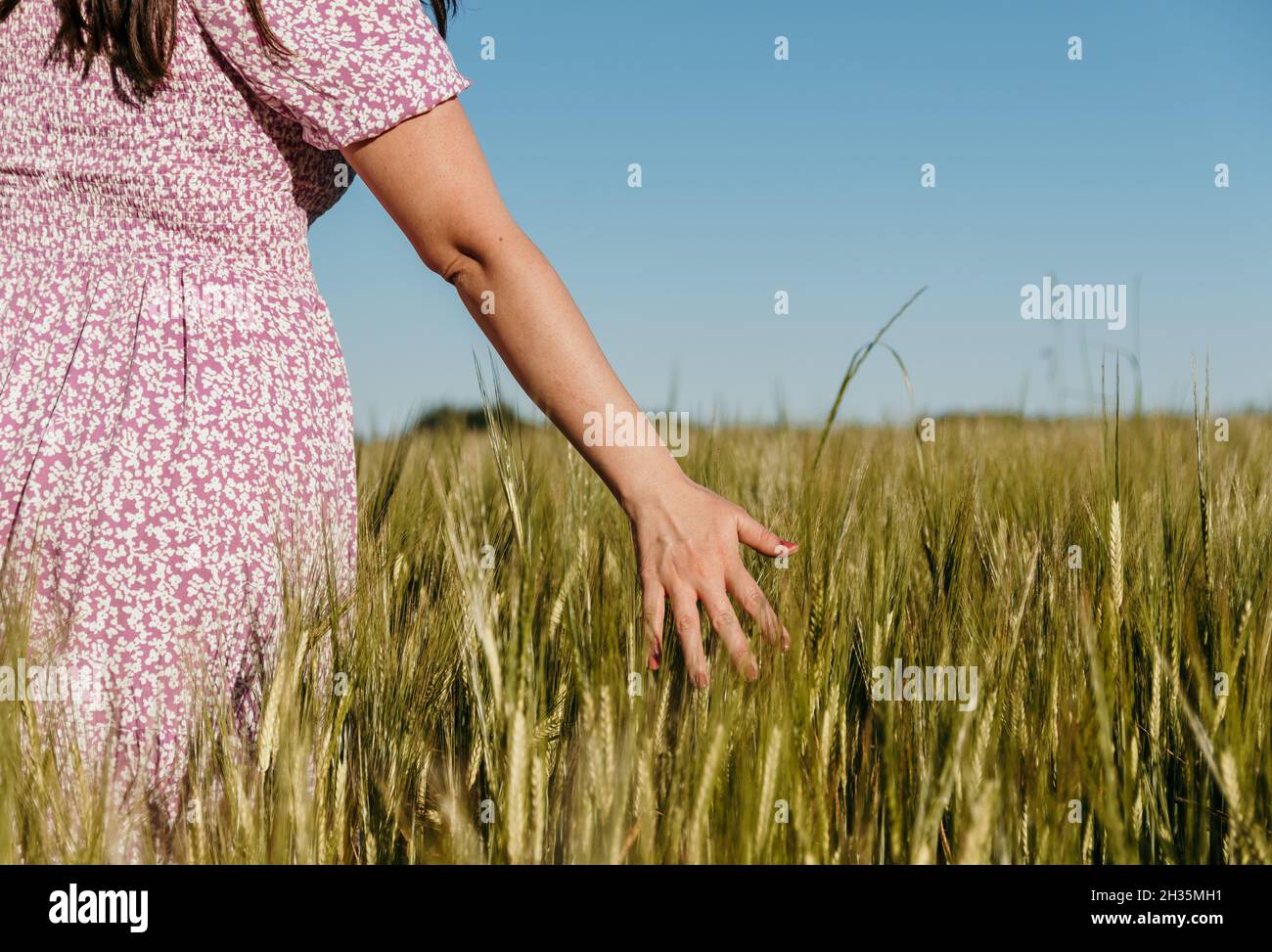 Woman walking in field hi-res stock photography and images - Alamy