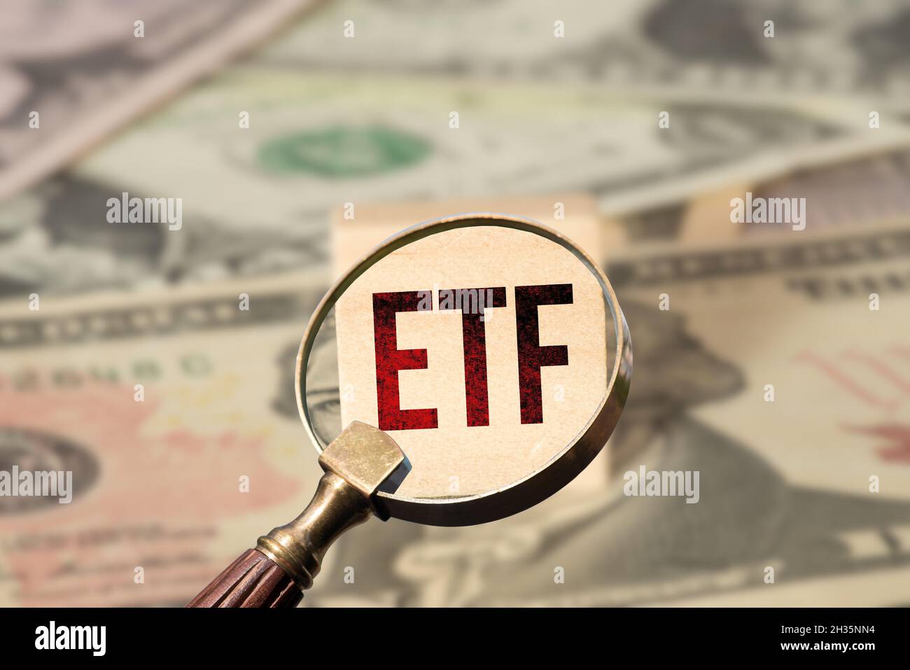 Dollar bills and ETF Stock Photo - Alamy