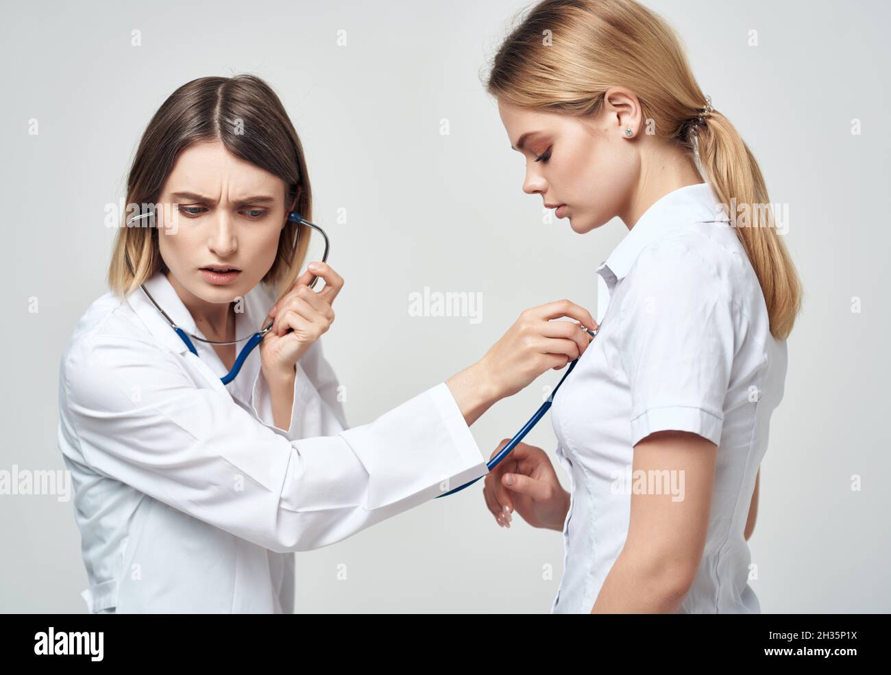 nurse stethoscope healing procedures Studio hospital Stock Photo - Alamy