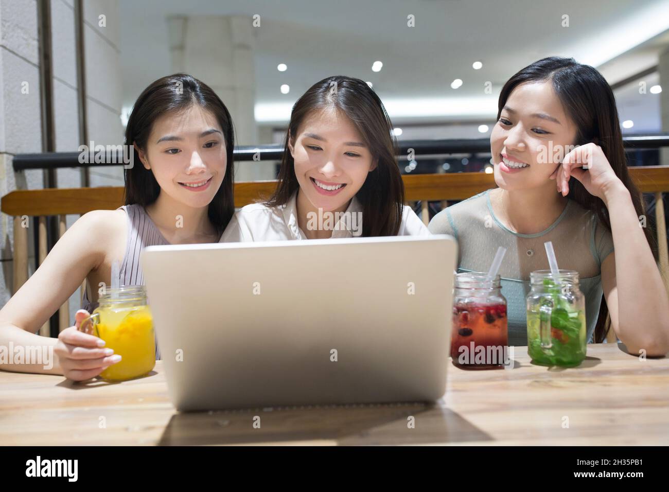 Three best friends getting together Stock Photo - Alamy