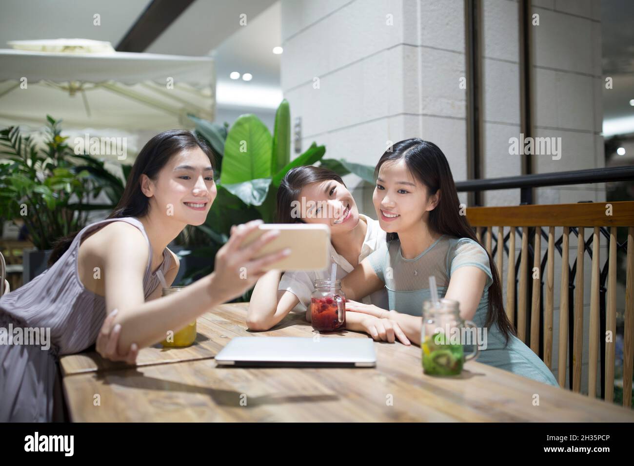 Three best friends getting together Stock Photo - Alamy
