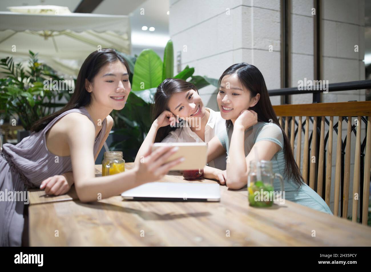 Three best friends getting together Stock Photo - Alamy
