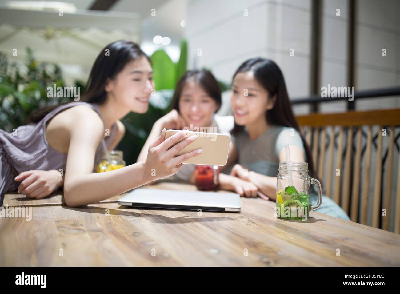 Three best friends getting together Stock Photo - Alamy