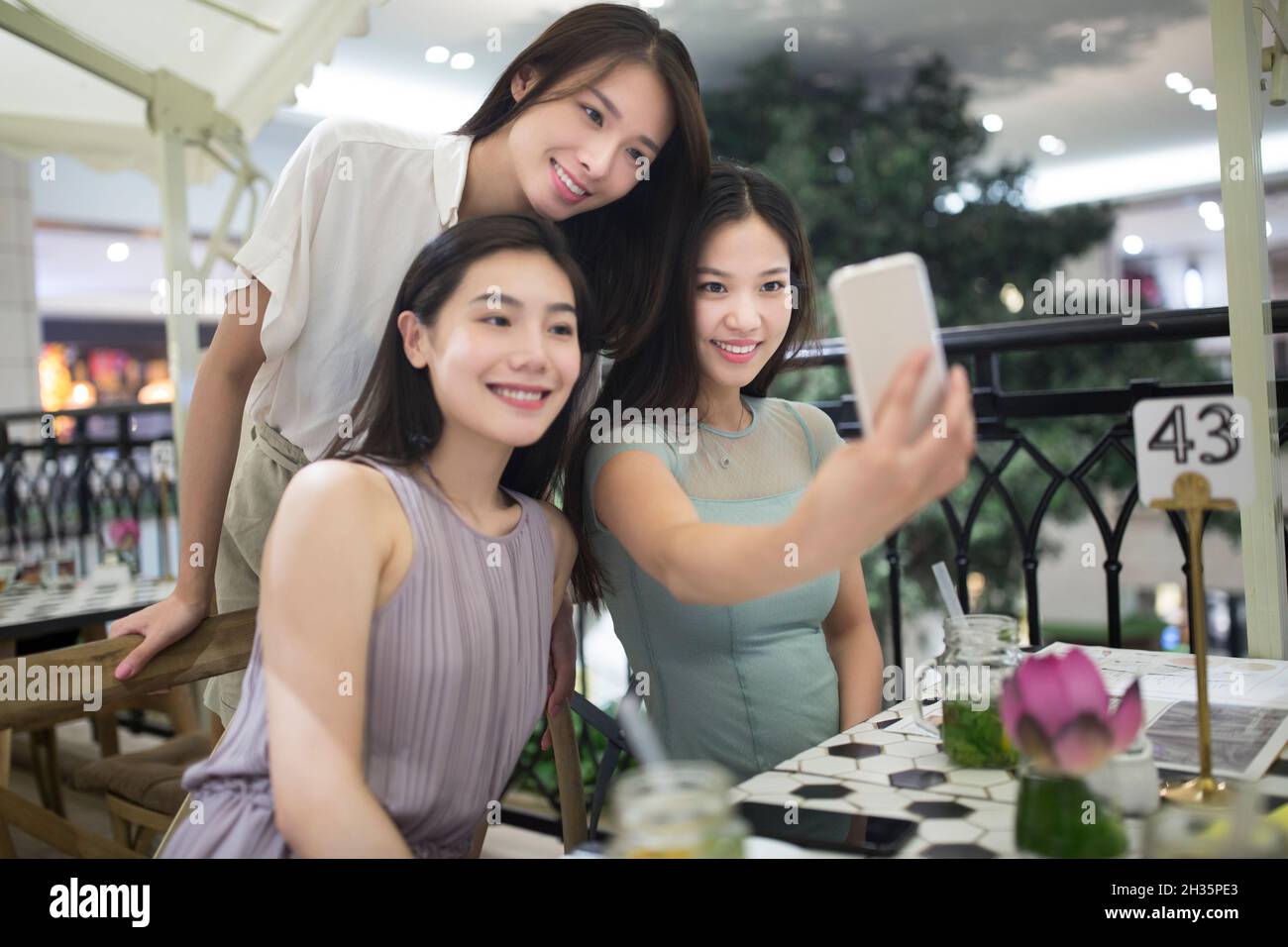 Three best friends getting together Stock Photo - Alamy