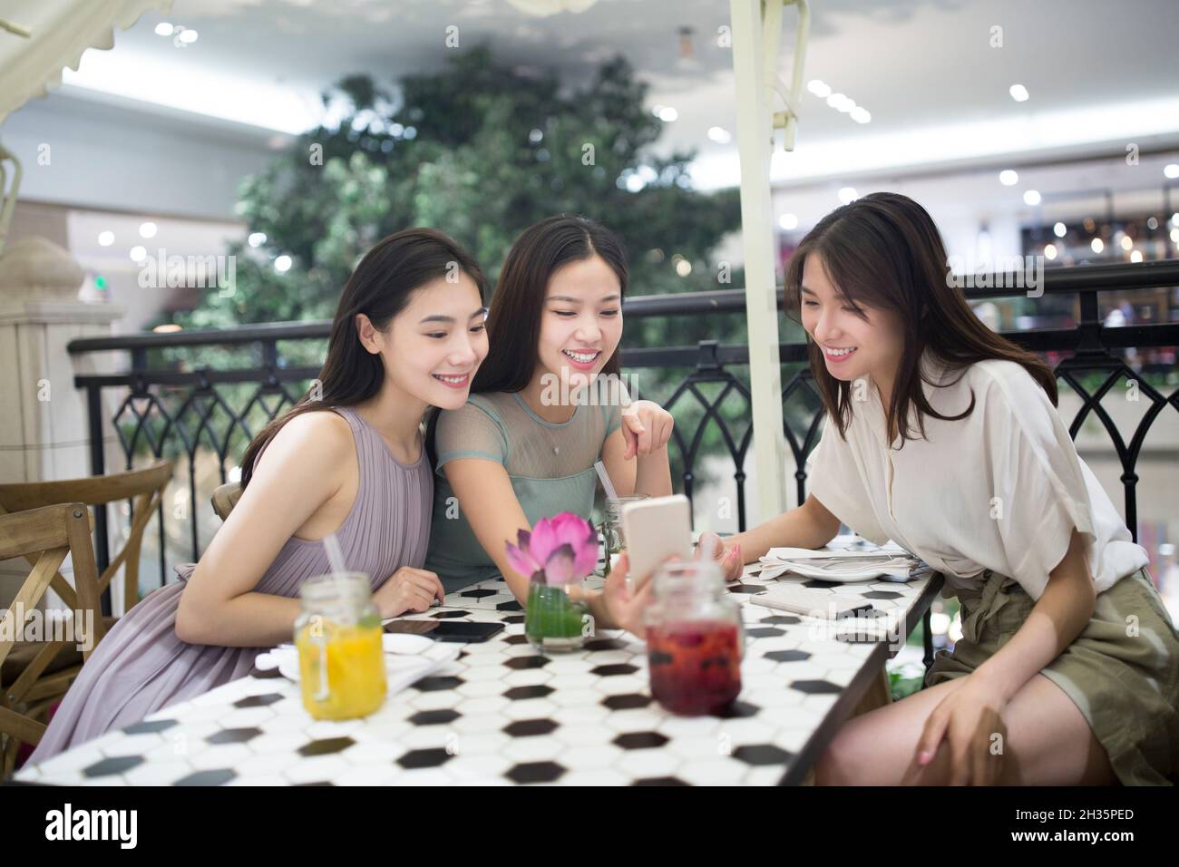 Three best friends getting together Stock Photo - Alamy