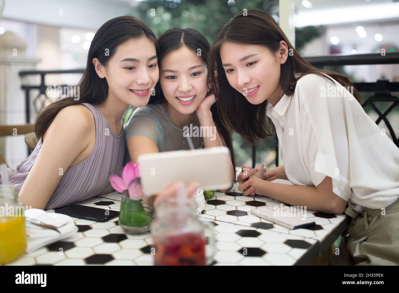 Three best friends getting together Stock Photo - Alamy
