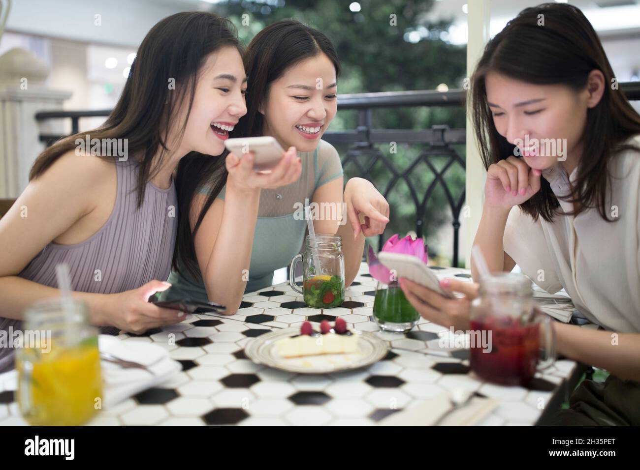 Three best friends getting together Stock Photo - Alamy