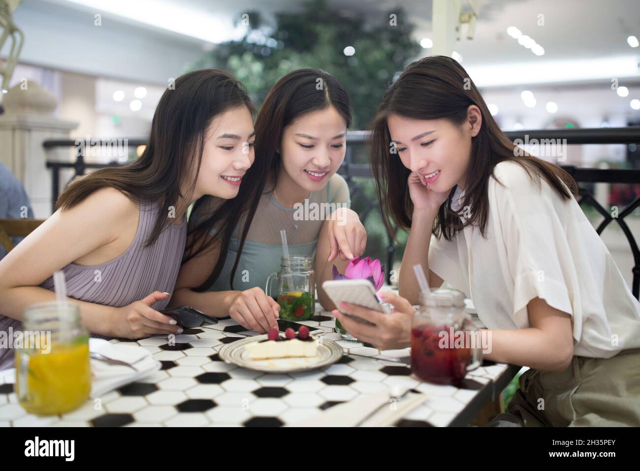 Three best friends getting together Stock Photo - Alamy
