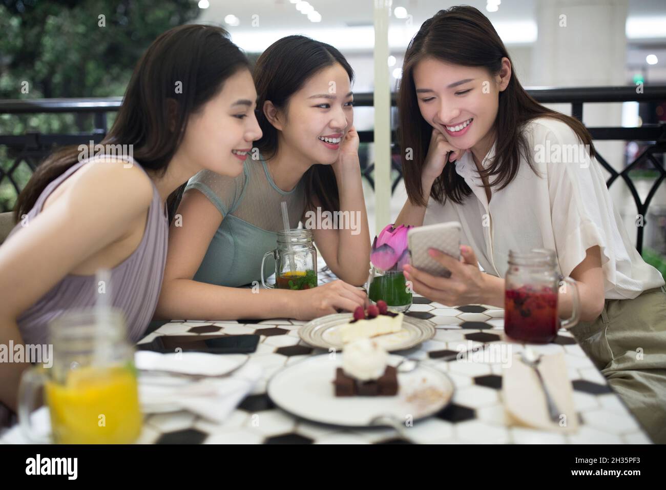 Three best friends getting together Stock Photo - Alamy