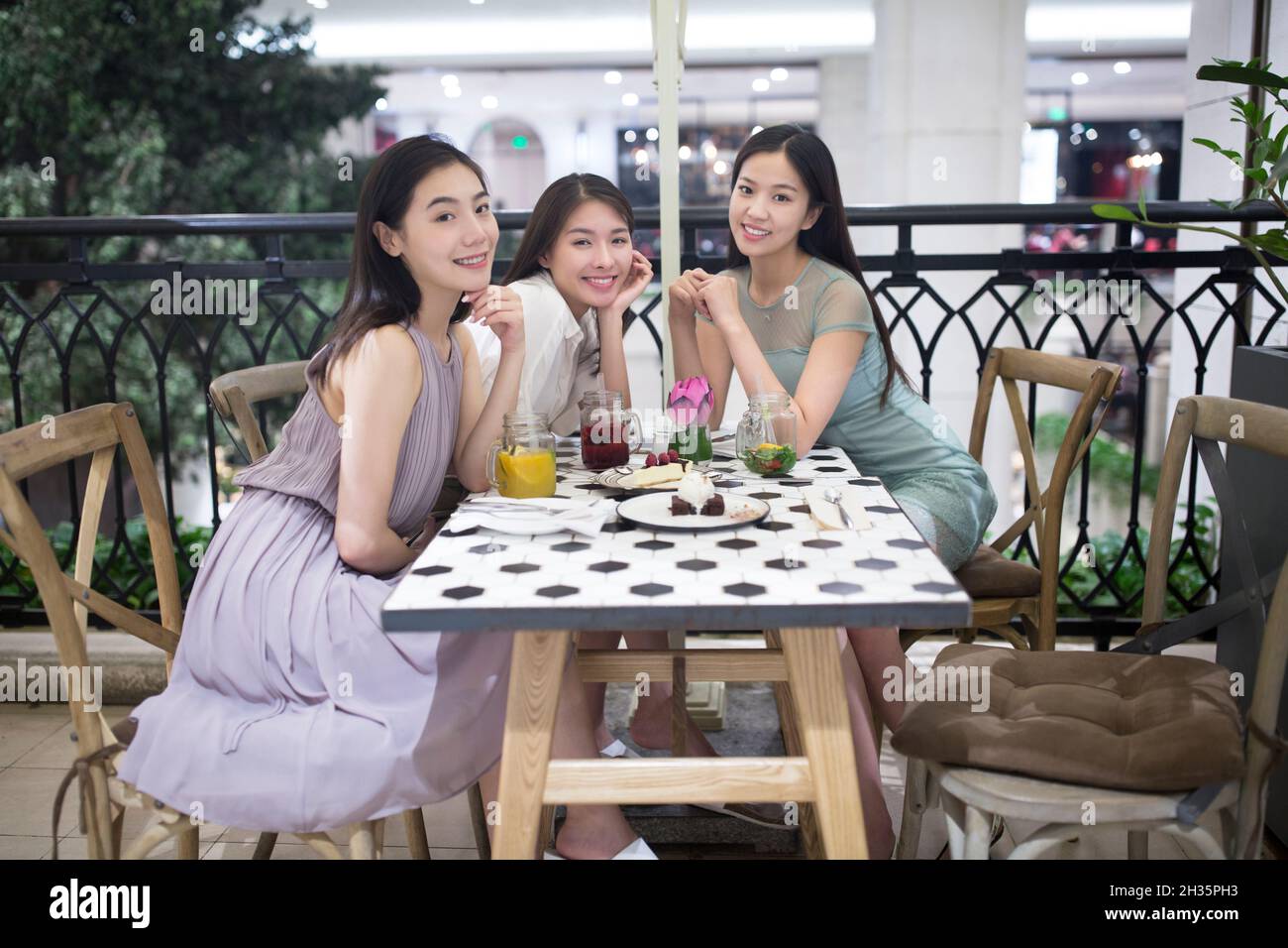Three best friends getting together Stock Photo - Alamy