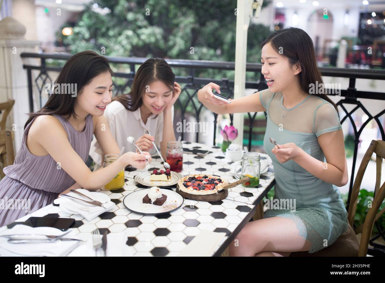Three best friends getting together Stock Photo - Alamy