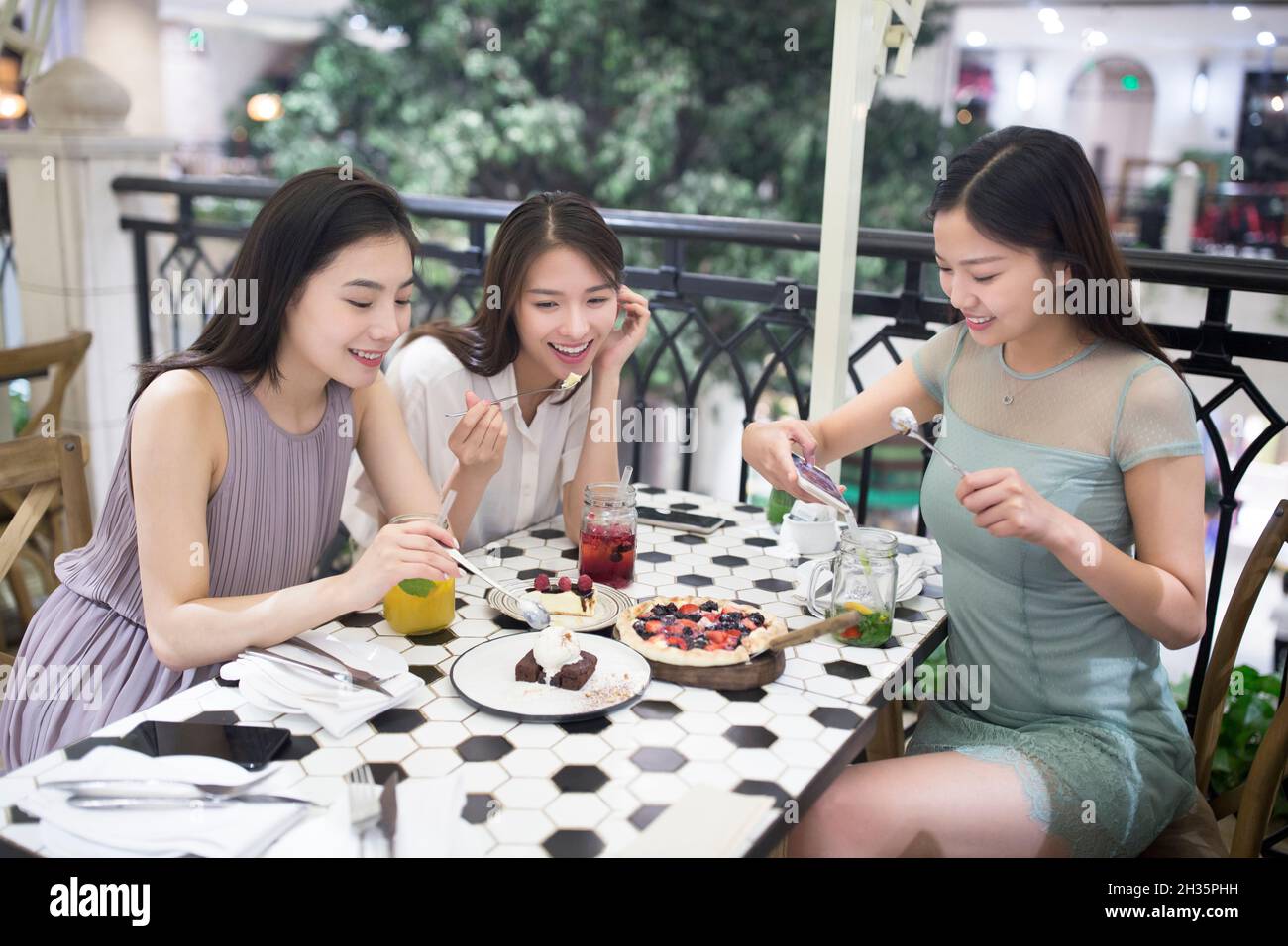 Three best friends getting together Stock Photo - Alamy