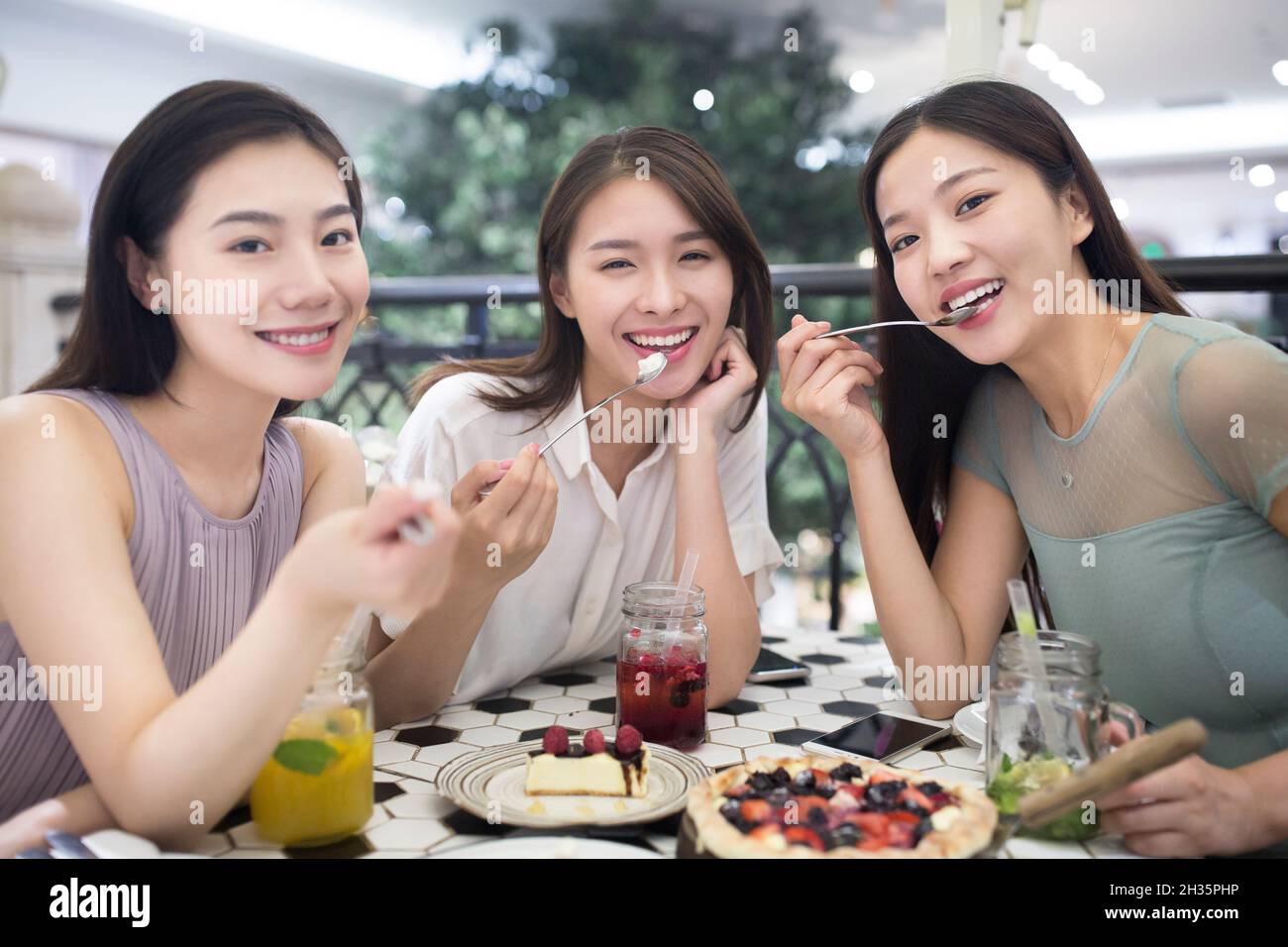 Three best friends getting together Stock Photo - Alamy