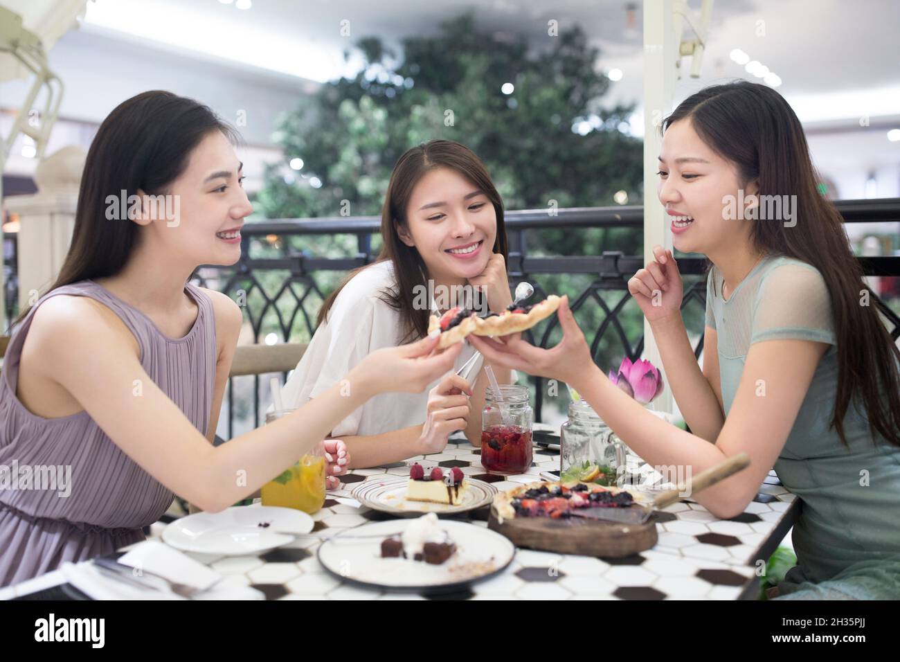 Three best friends getting together Stock Photo - Alamy