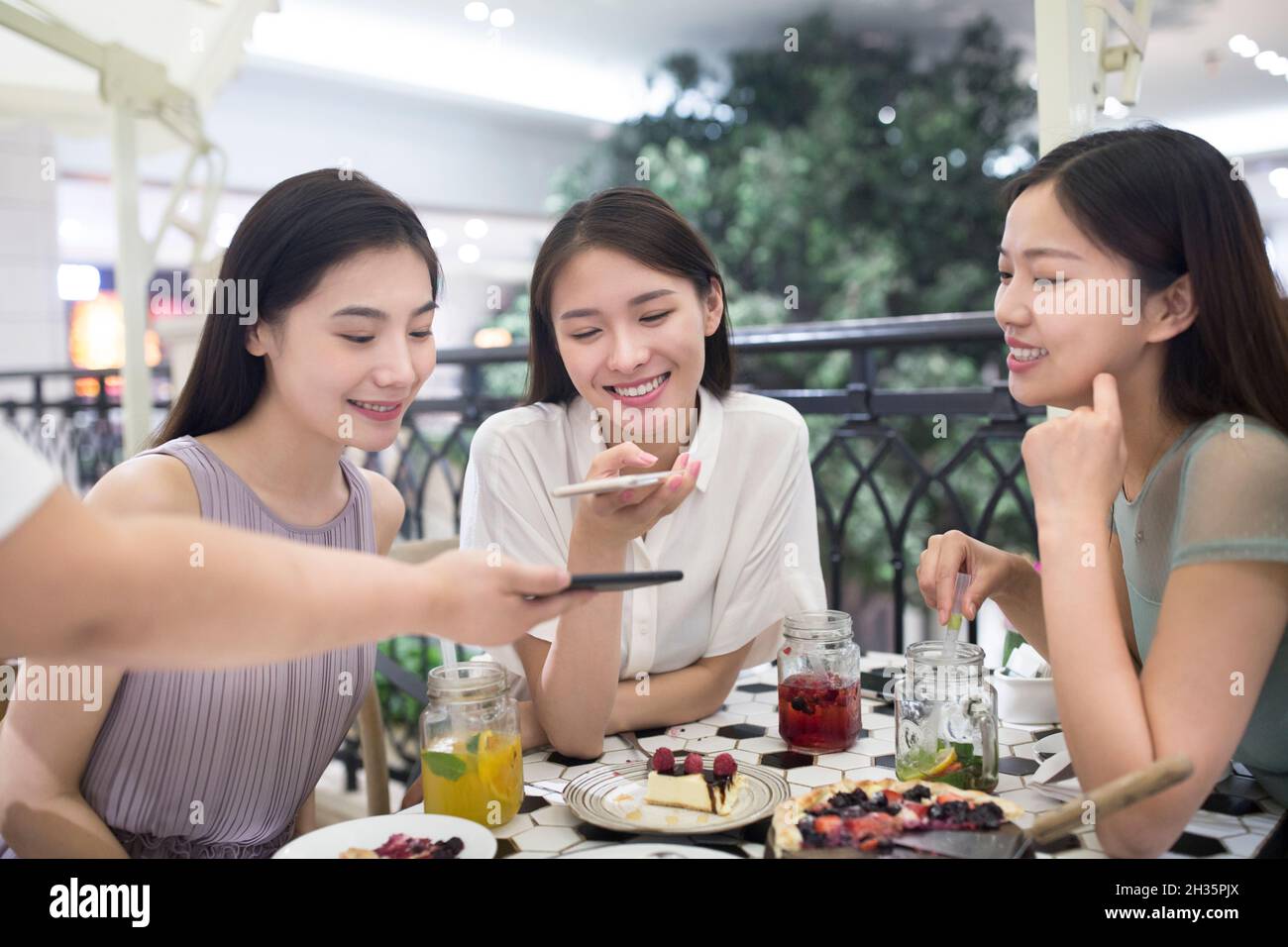 Three female friends bar hi-res stock photography and images - Alamy