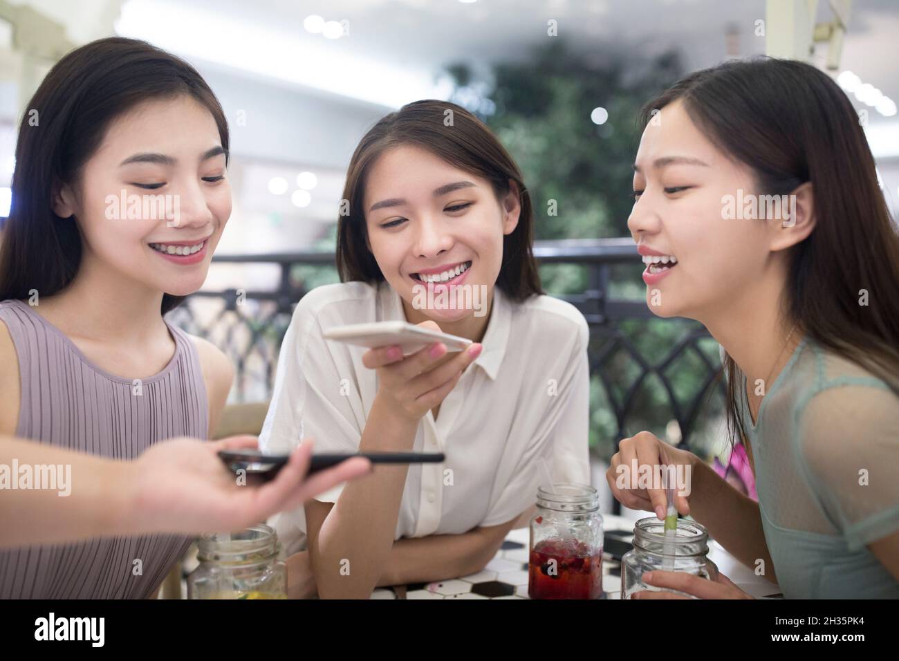 Three best friends getting together Stock Photo - Alamy