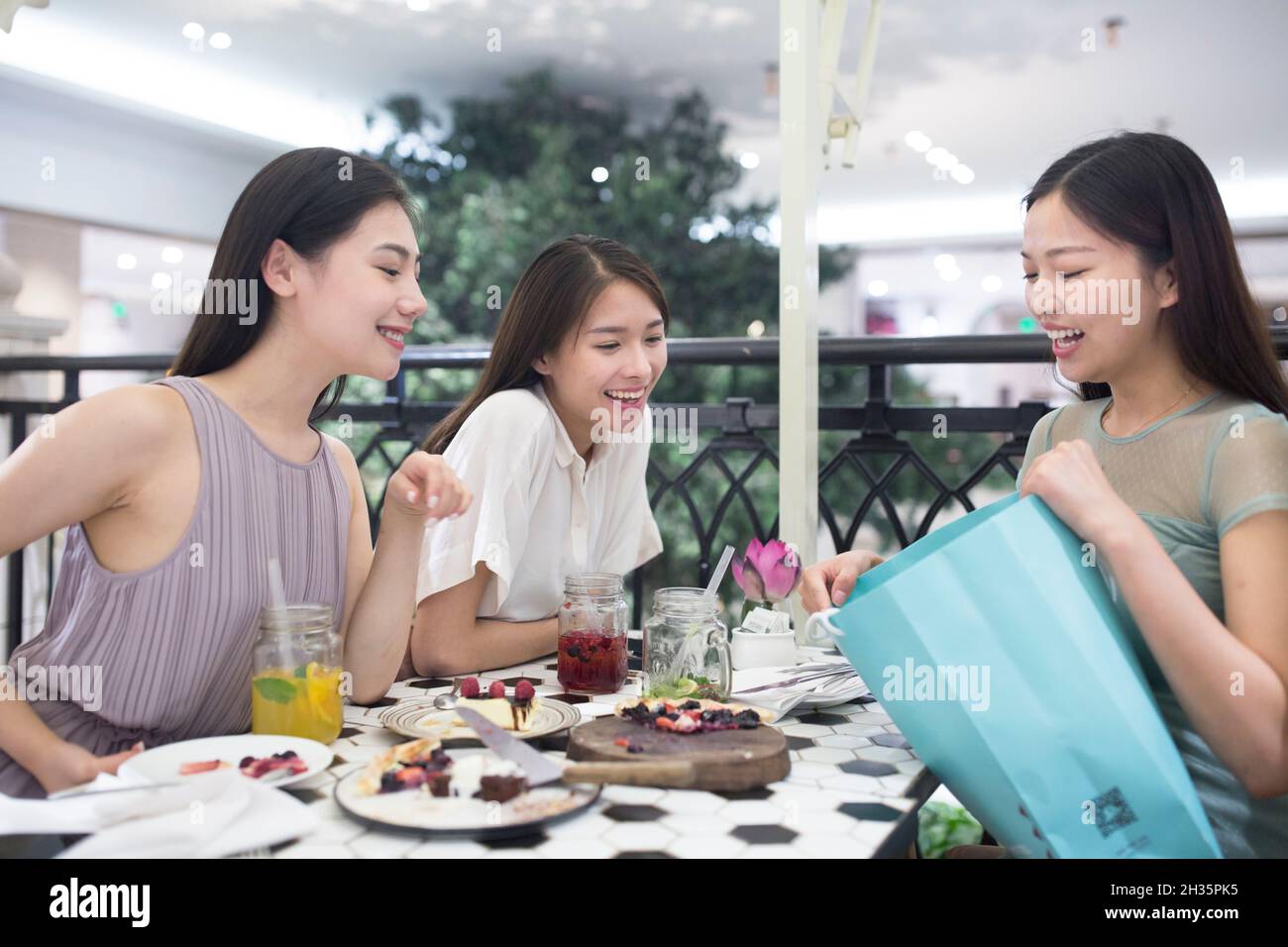 Three best friends getting together Stock Photo - Alamy