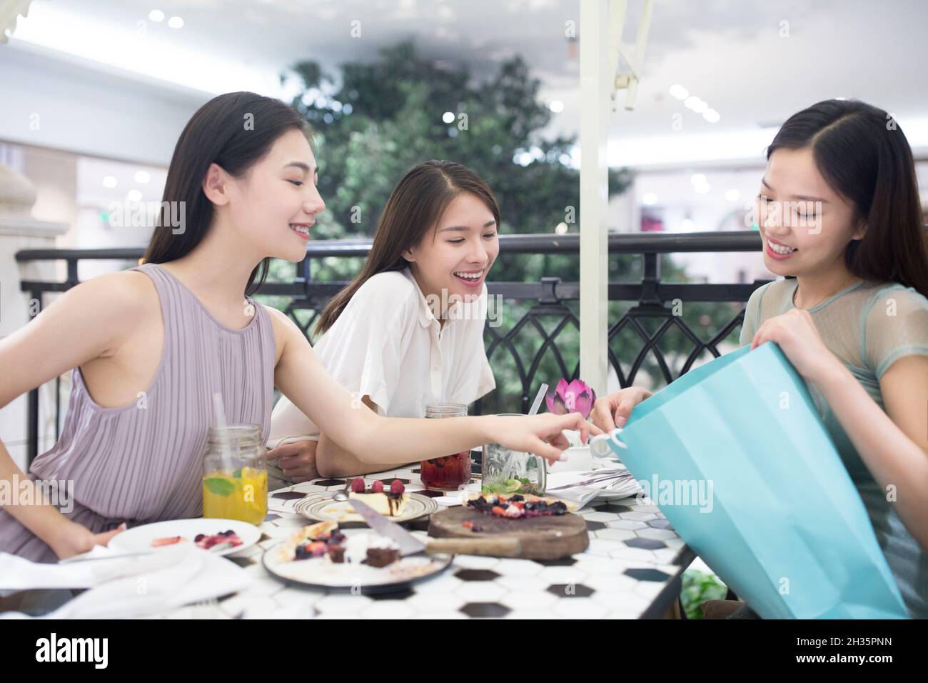 Three best friends getting together Stock Photo - Alamy