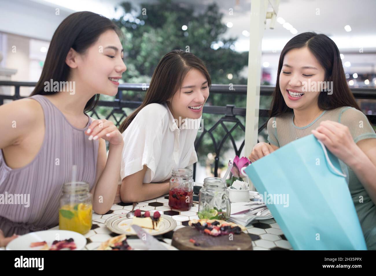 Three best friends getting together Stock Photo - Alamy
