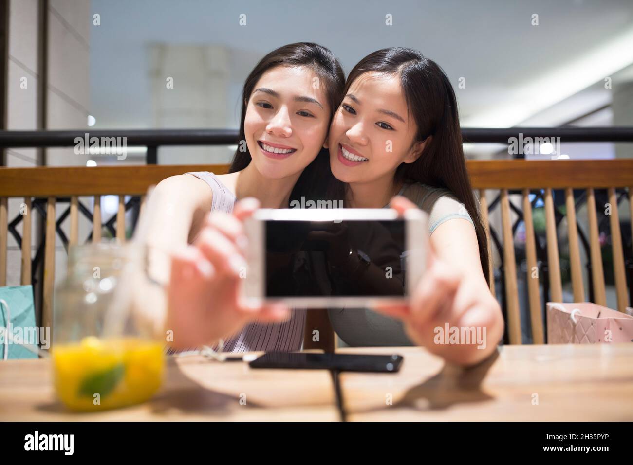 Two women taking selfies hi-res stock photography and images - Alamy