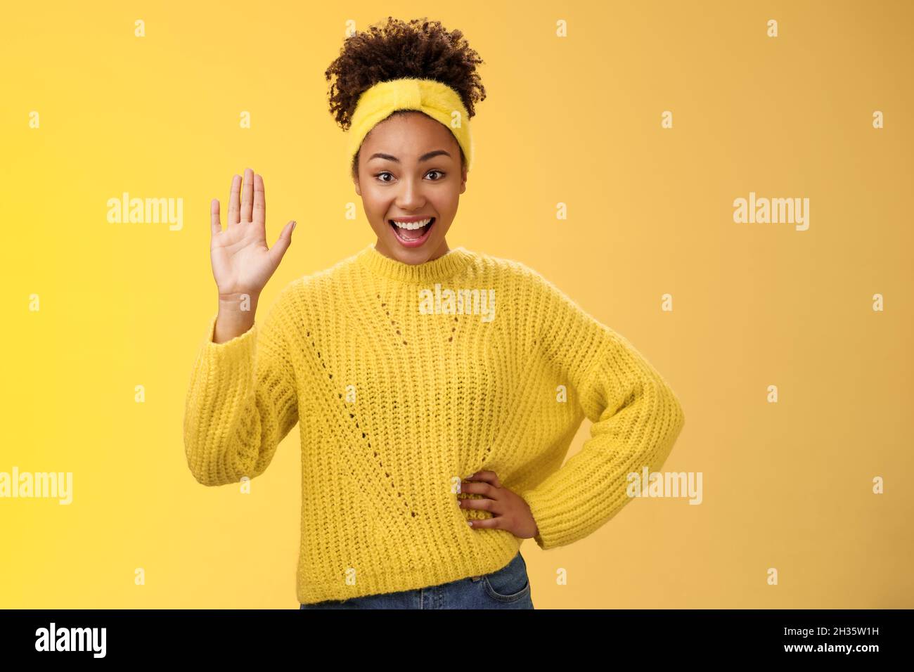 Portrait african woman waving welcoming hi-res stock photography and ...