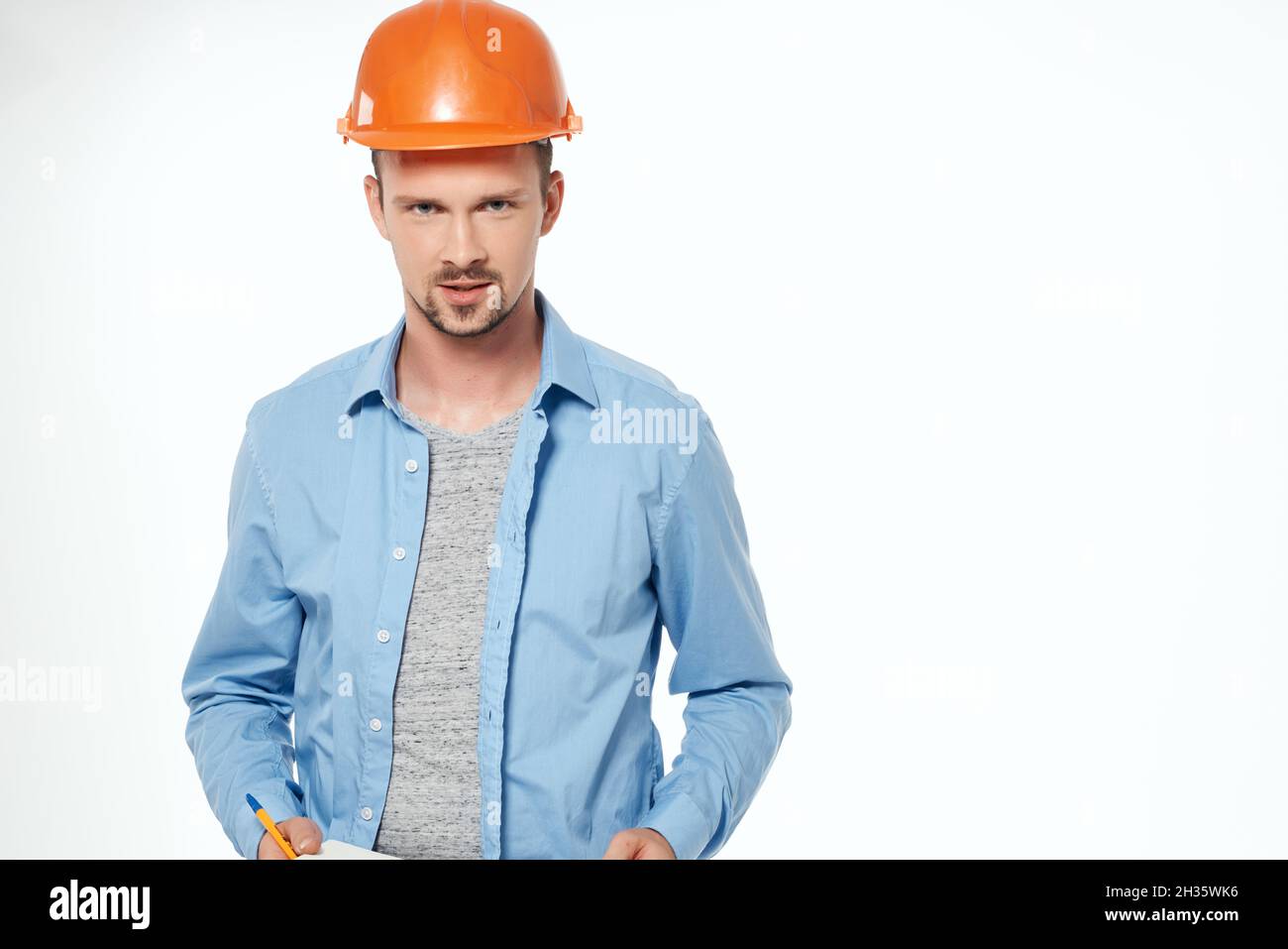 male builders blueprints builder Working profession Stock Photo - Alamy