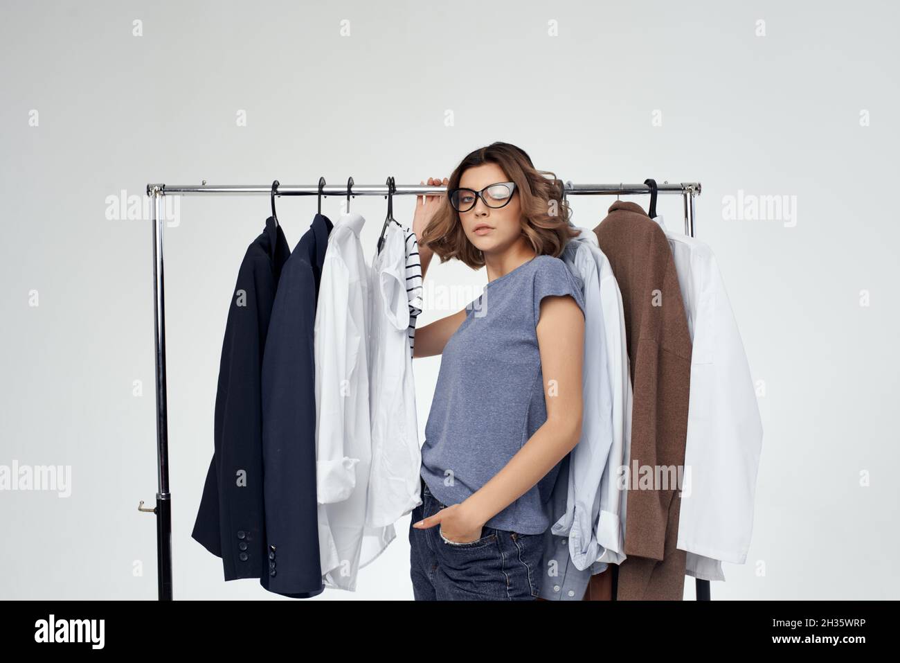 pretty woman clothes fitting modern style studio emotion Stock Photo ...