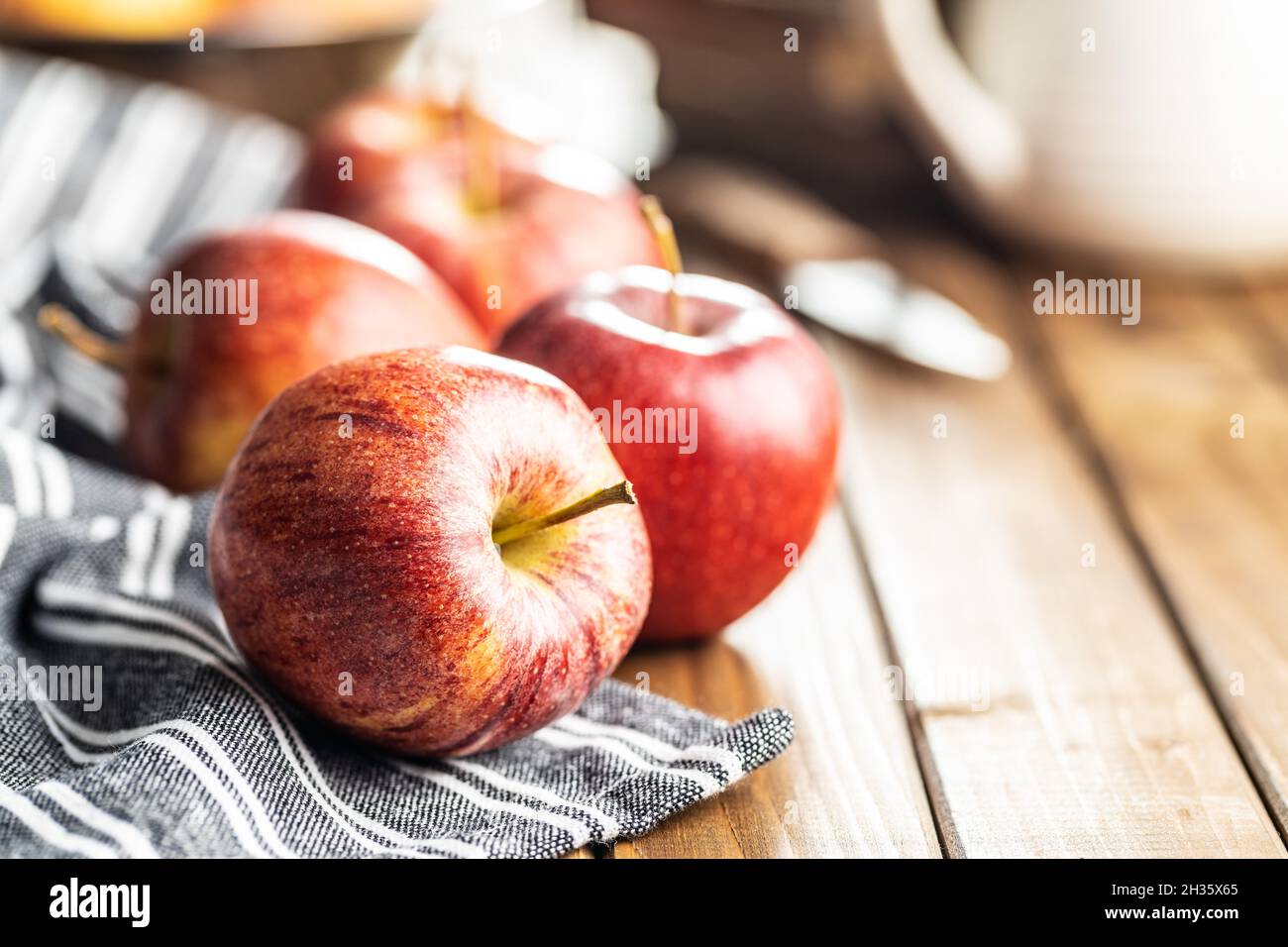 Fresh autumn apples on wooden table Stock Photo - Alamy