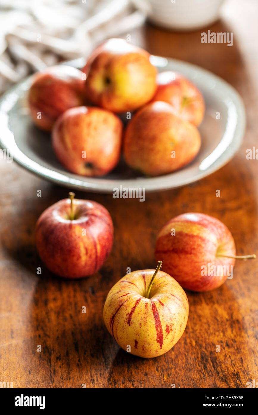 Fresh autumn apples on wooden table Stock Photo - Alamy