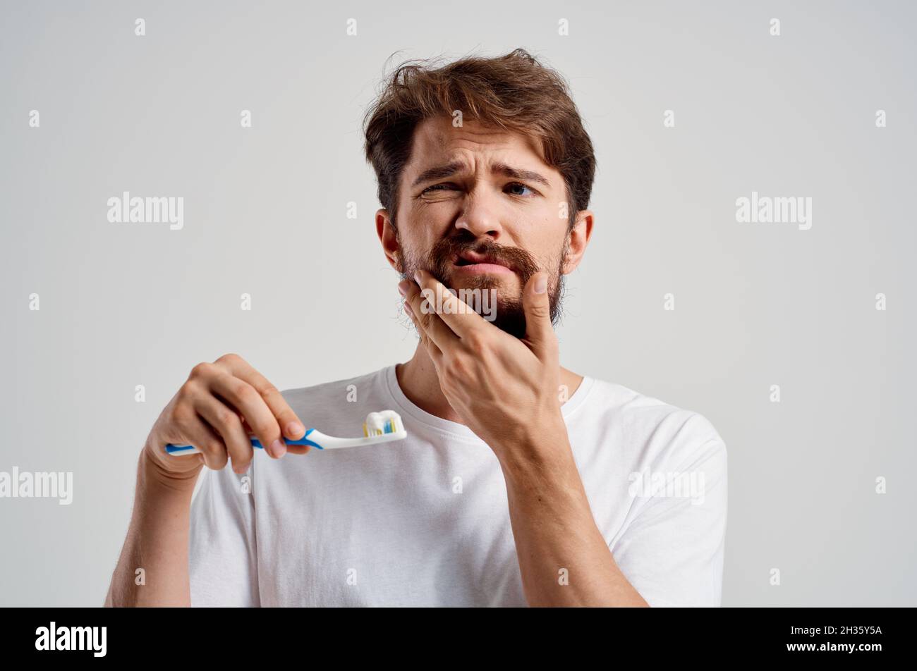 emotional man hygiene toothpaste morning isolated background Stock ...
