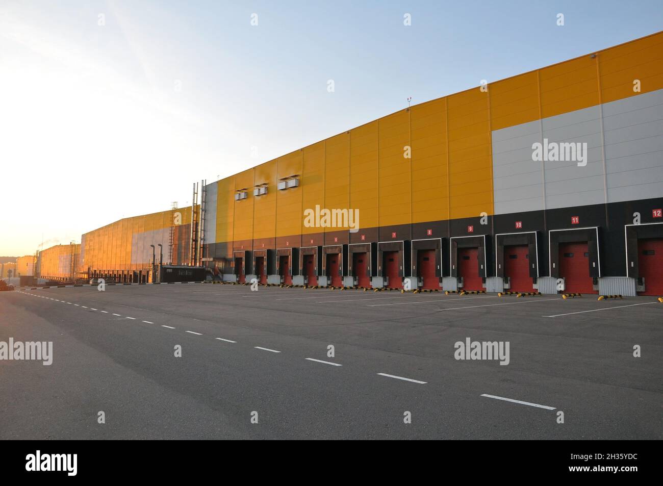 Empty loading bay of a large logistics center. Warehouse Stock Photo ...