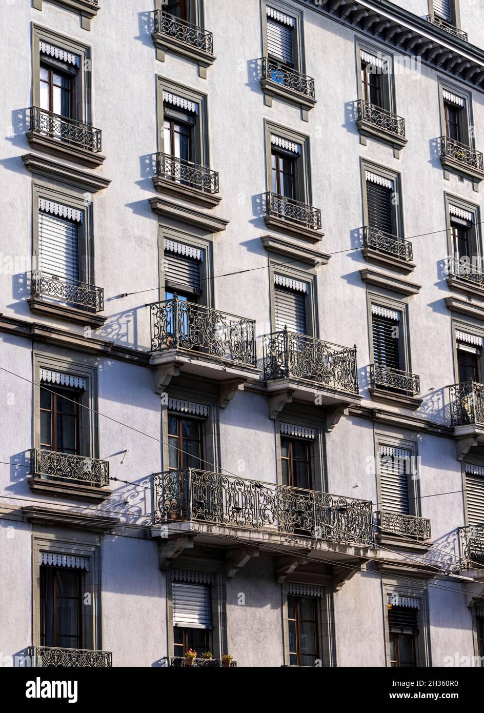 early 20th century apartment block with wrought iron balconies, central ...