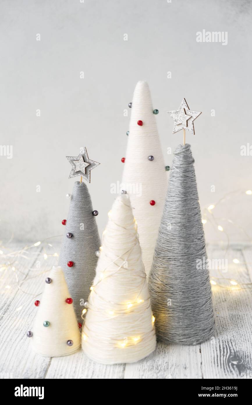 Handmade Christmas trees. Yarn wrapped cone trees and garland. XMAS ...