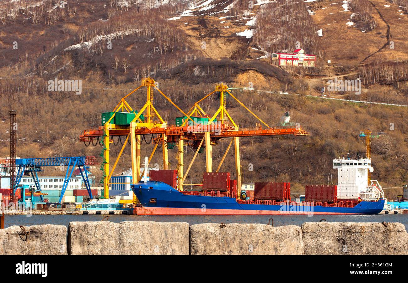 ship containers at the seaport of Avacha Bay on the Kamchatka peninsula ...