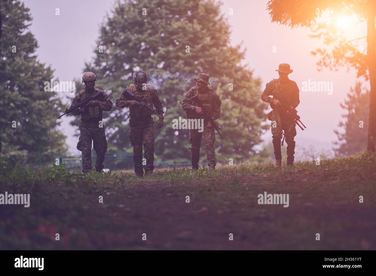 soldiers squad relaxed walking after battle Stock Photo - Alamy